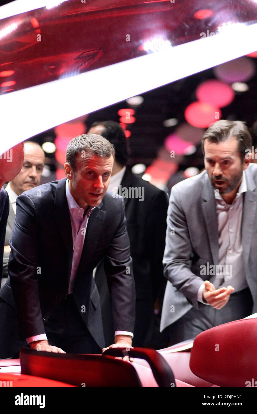 Emmanuel Macron visits the Paris Motor show on October 14, 2016 at ...