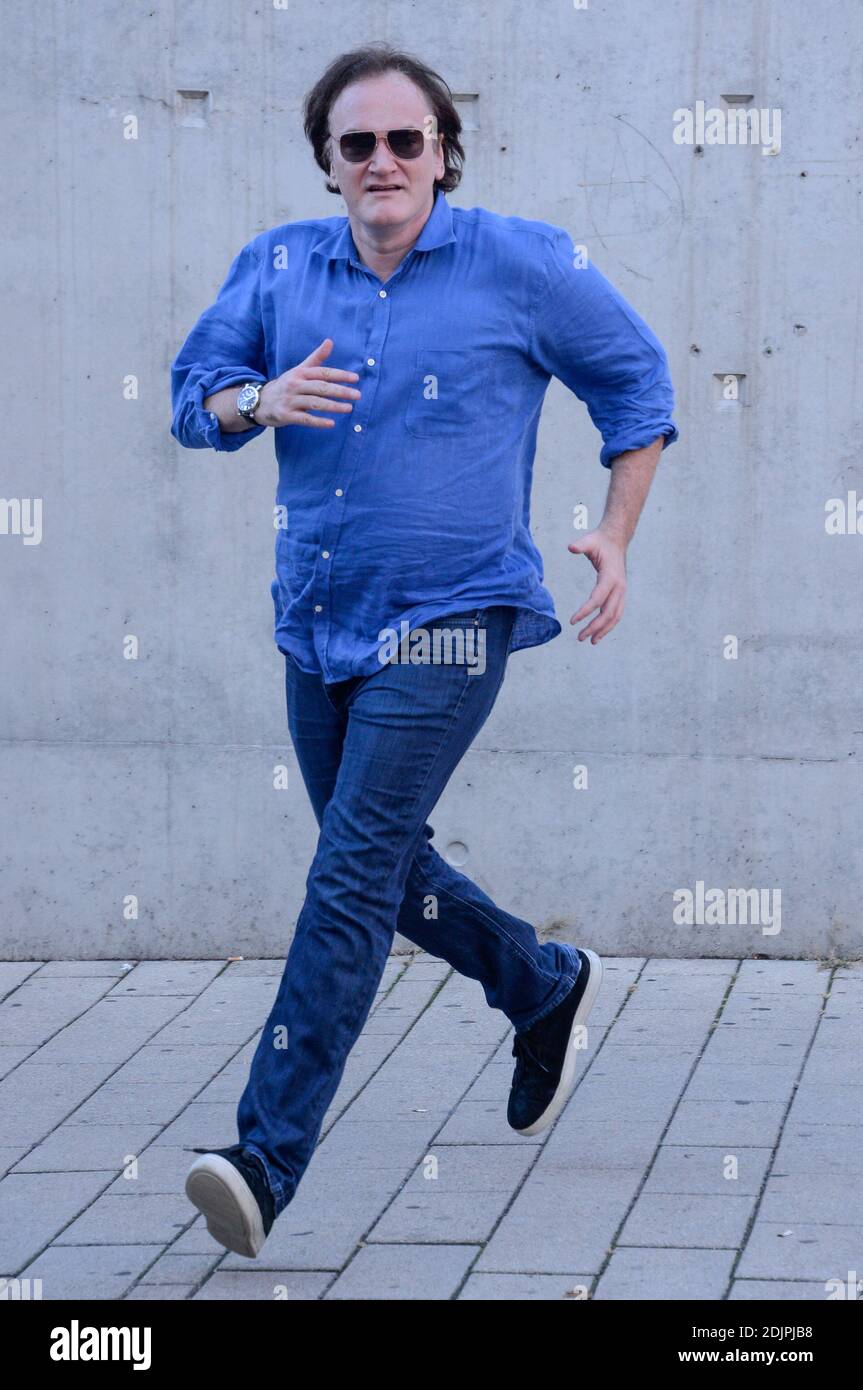 Quentin Tarantino attending the re-enactment of the first black and ...