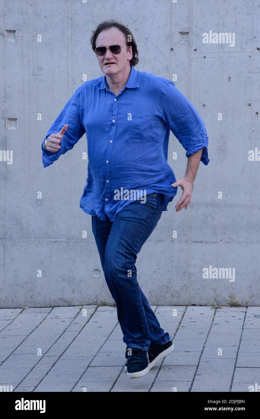 Quentin Tarantino attending the re-enactment of the first black and ...