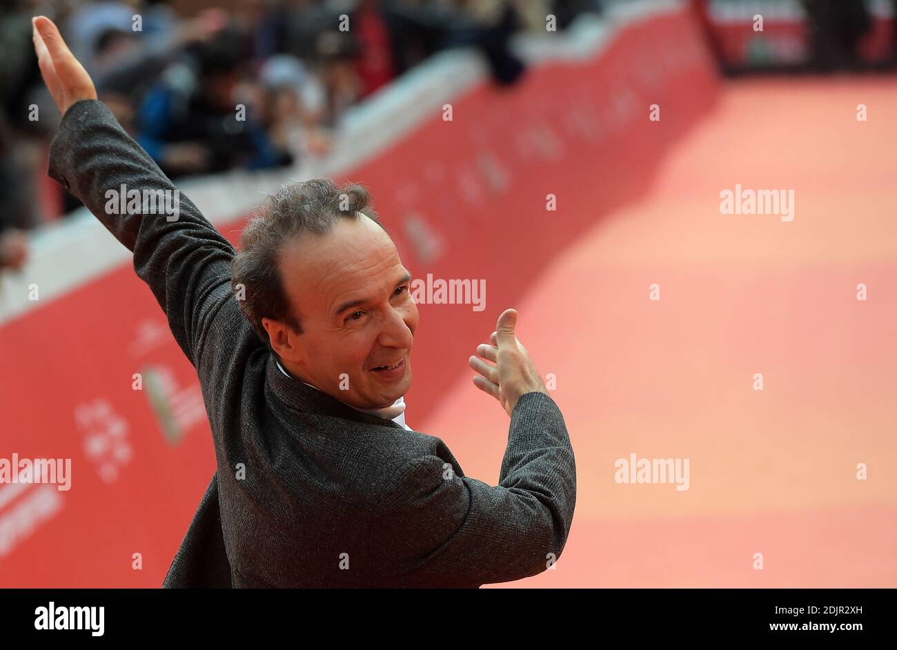 Italian actor and director Roberto Benigni walks the red carpet during ...
