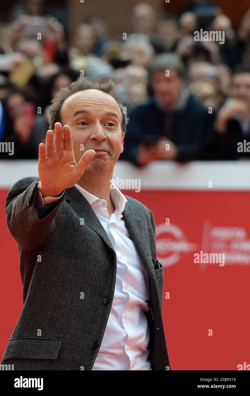 Italian actor and director Roberto Benigni walks the red carpet during ...