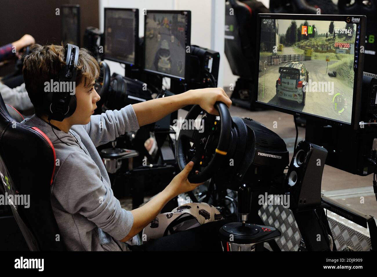 A gamer playing a video game during the opening of the Paris Games Week ...