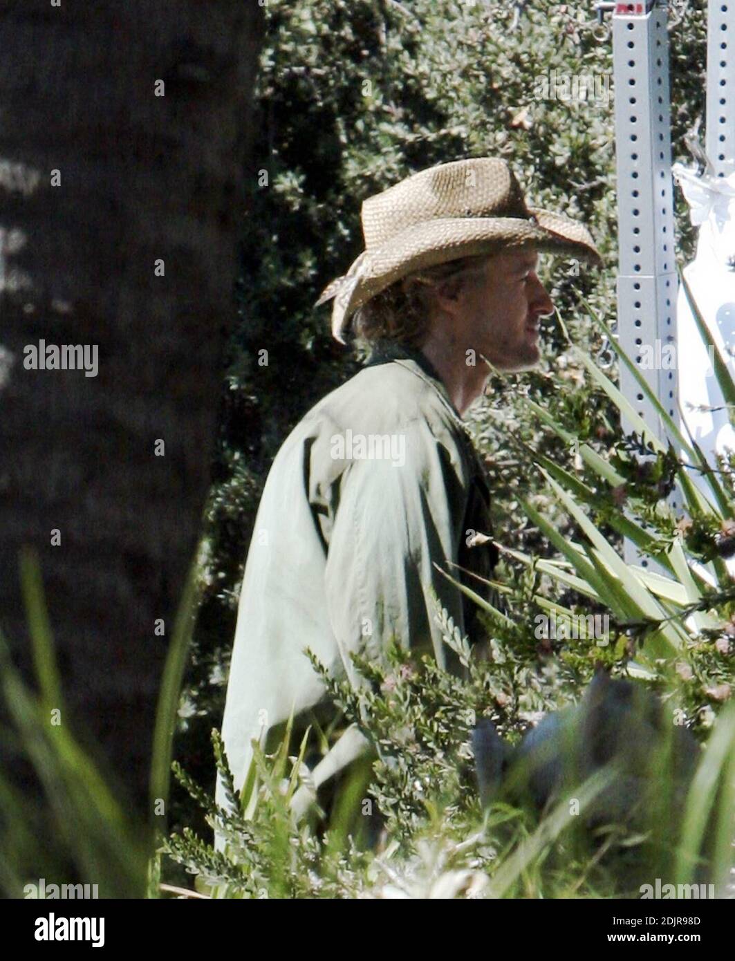 Why is Owen Wilson hiding in the bushes? He's shooting a scene for his ...