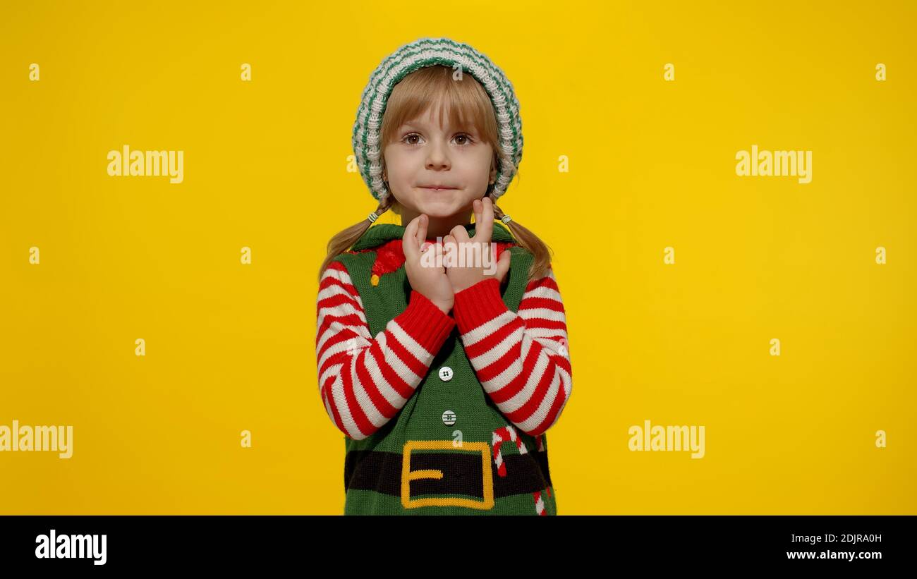 Christmas wish concept. Little fun blonde kid teen teenager girl in ...