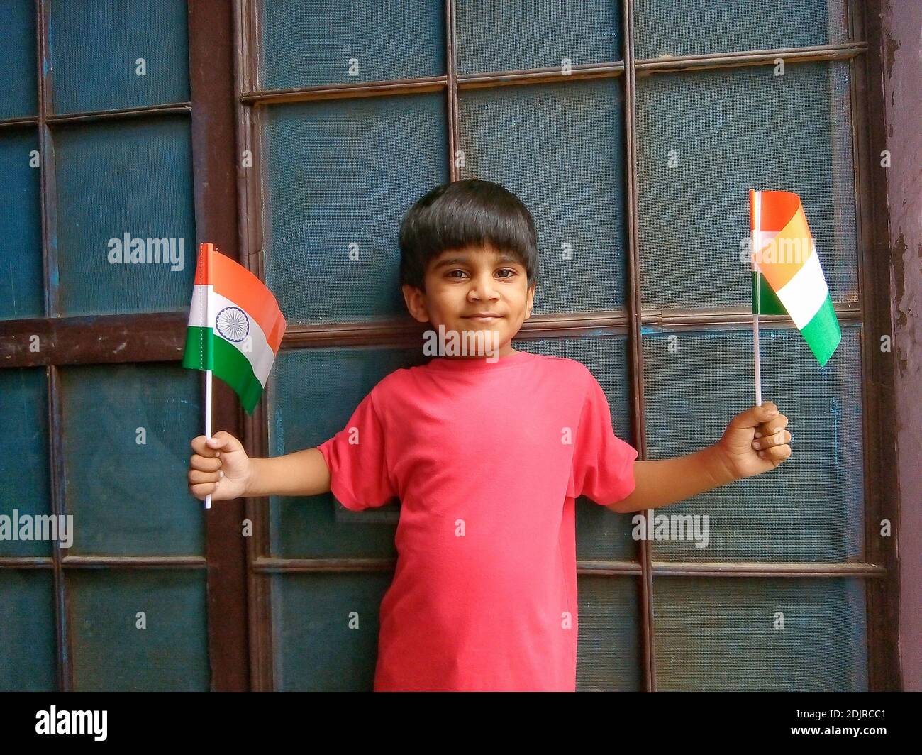 Boys holding indian flags hi-res stock photography and images - Alamy