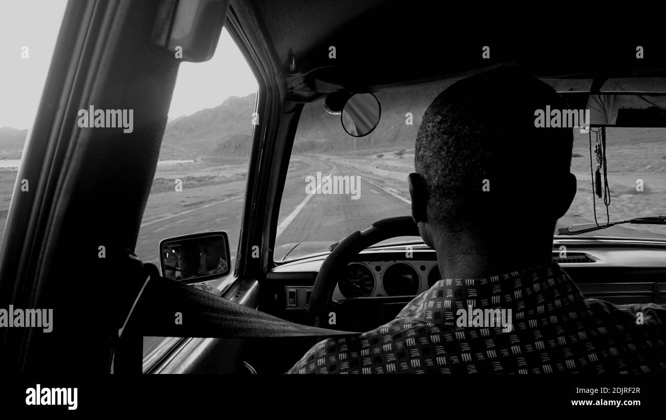 Car driving rear view Black and White Stock Photos & Images - Alamy