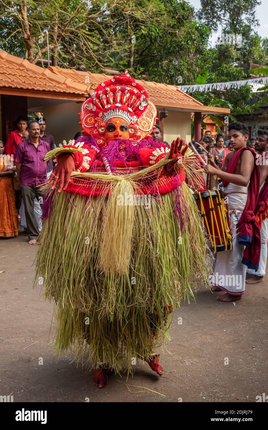 Theyyam artist perform during temple festival in Payyanur, Kerala ...