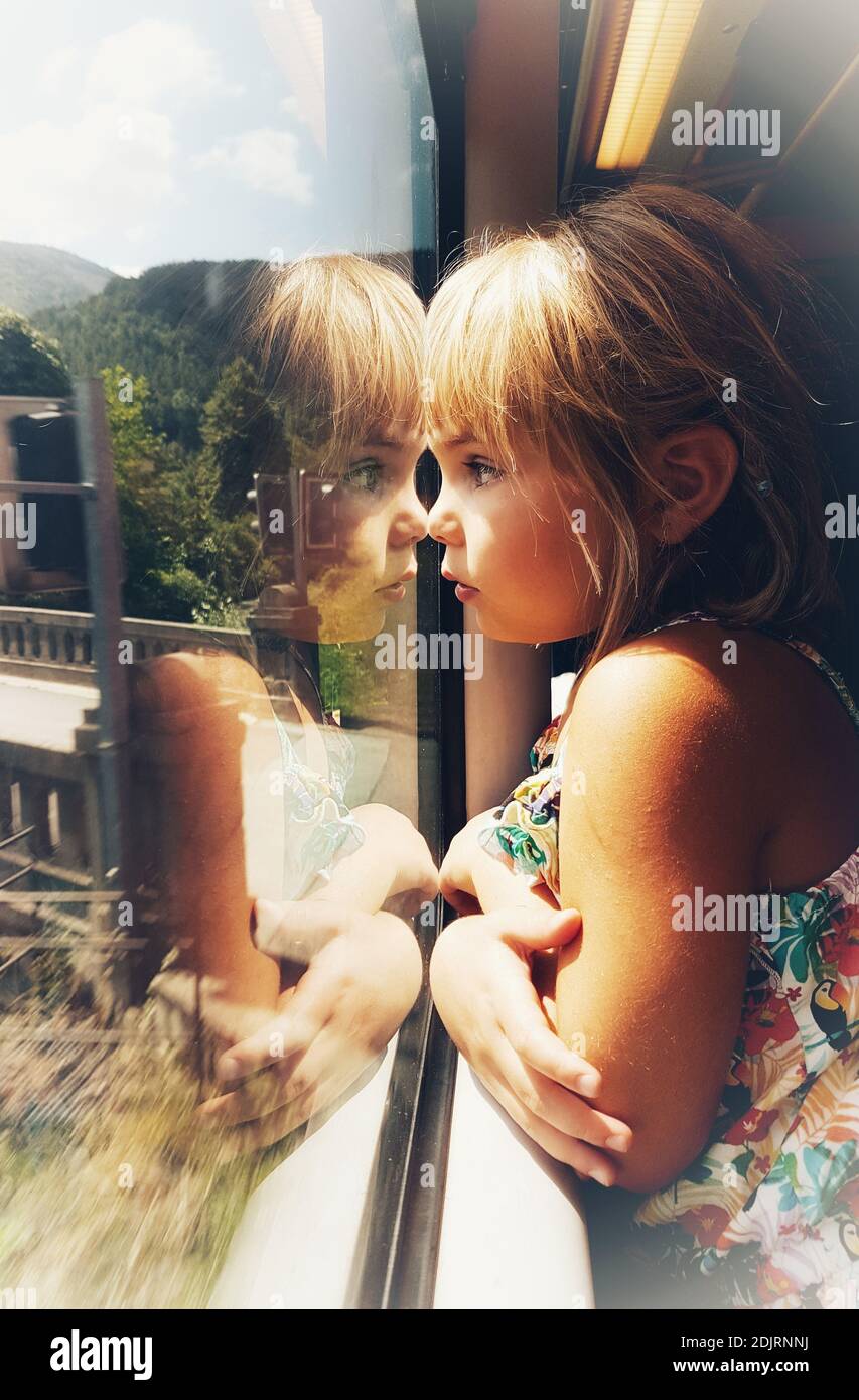 Girl on train reflection hi-res stock photography and images - Alamy
