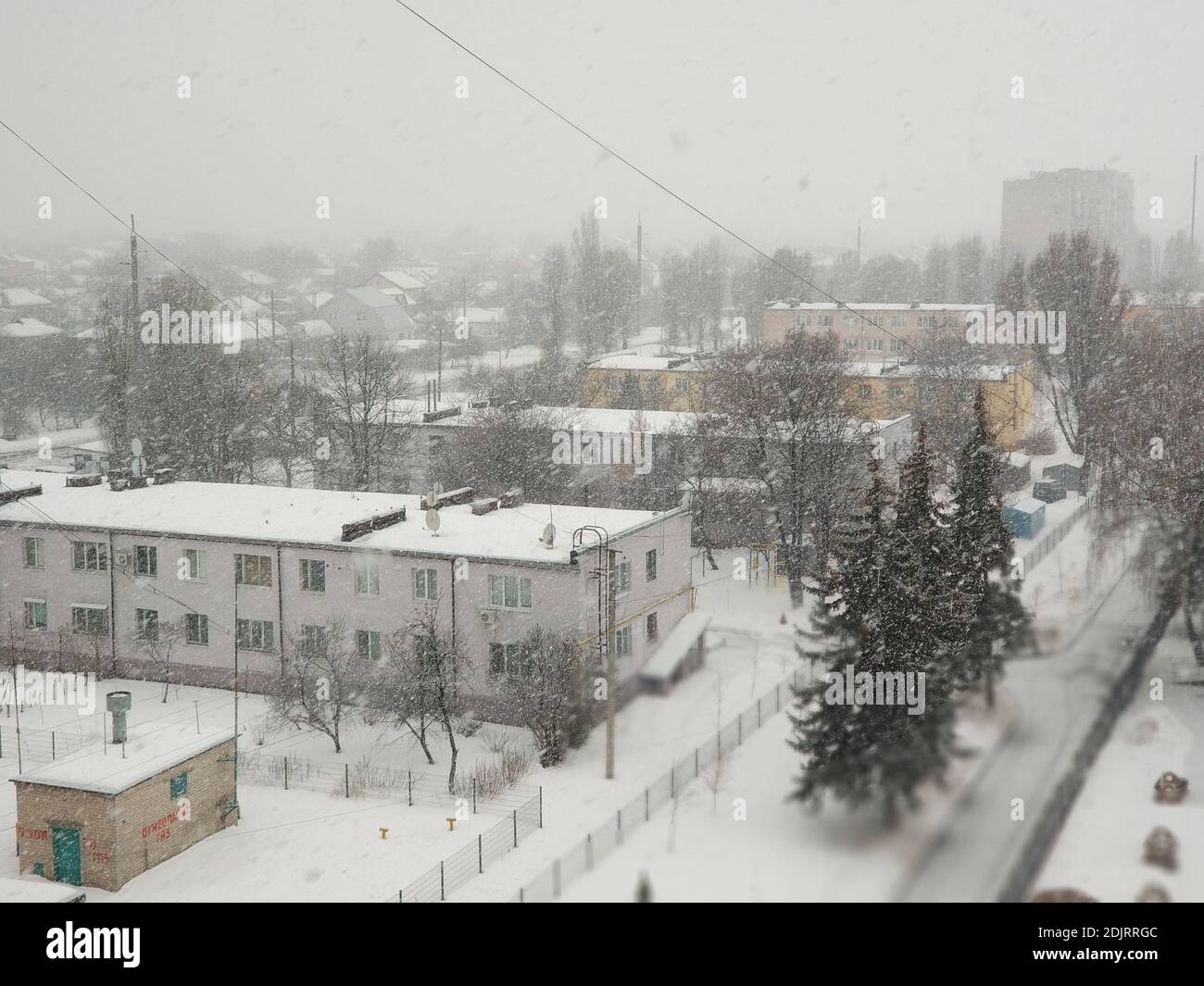 Winter landscape. The streets of a small town are covered with white ...
