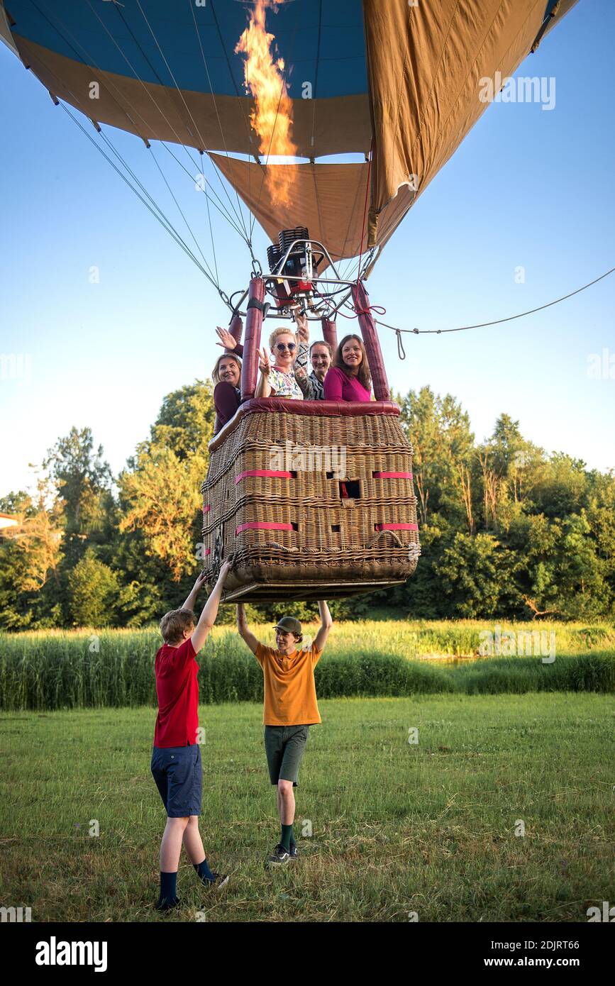 Child flying away balloon hi-res stock photography and images - Alamy