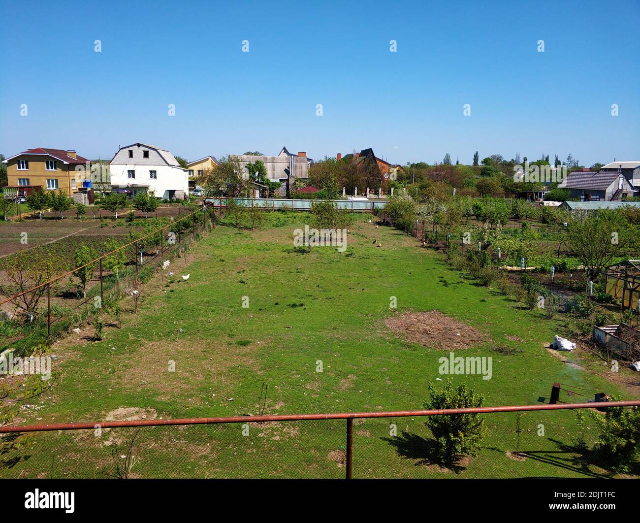 Top view of an empty piece of land in the village. Smooth rectangular ...