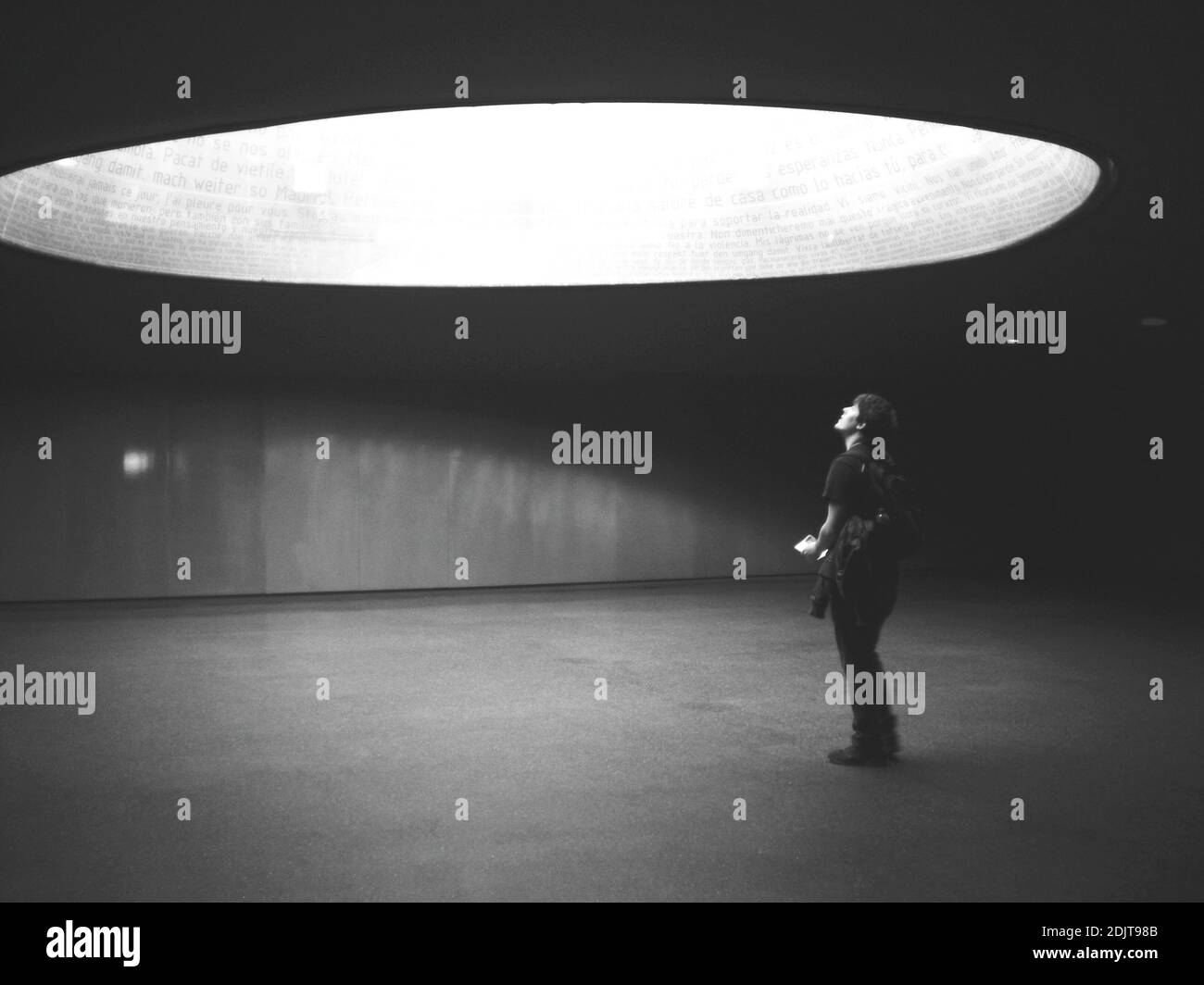 Standing under spotlight hi-res stock photography and images - Alamy