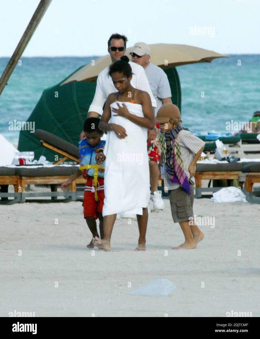 Barbara Becker and friends at the beach playing soccer and football ...