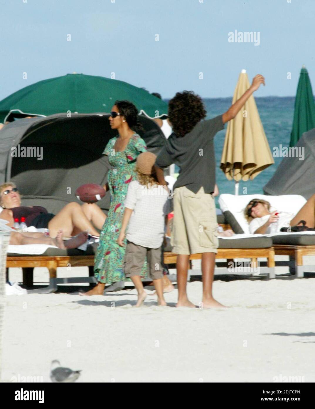 Barbara Becker and friends at the beach playing soccer and football ...