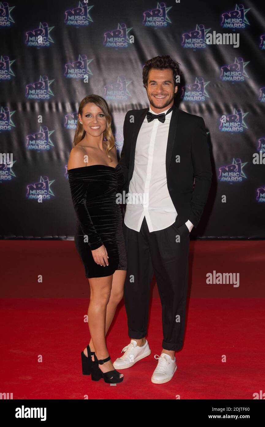 Amir and wife Lital arriving to the 18th NRJ Music Awards ceremony held ...