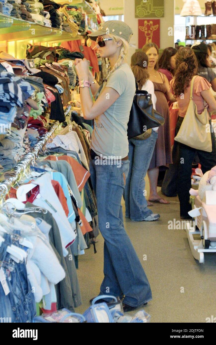 Paris spends the afternoon at Kitson in Los Angeles, Ca. buying a ...