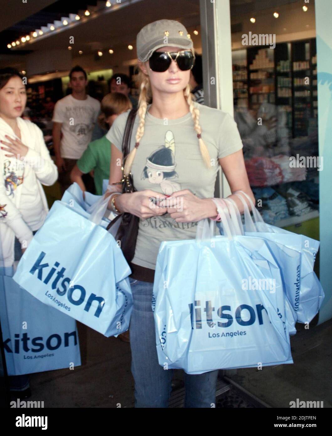 Paris spends the afternoon at Kitson in Los Angeles, Ca. buying a ...