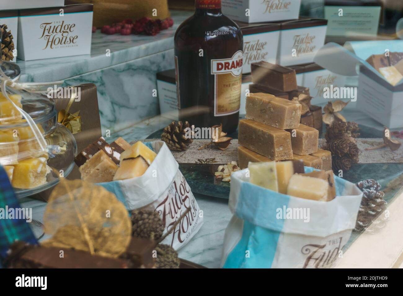 Fudge behind window at scottish store Stock Photo - Alamy