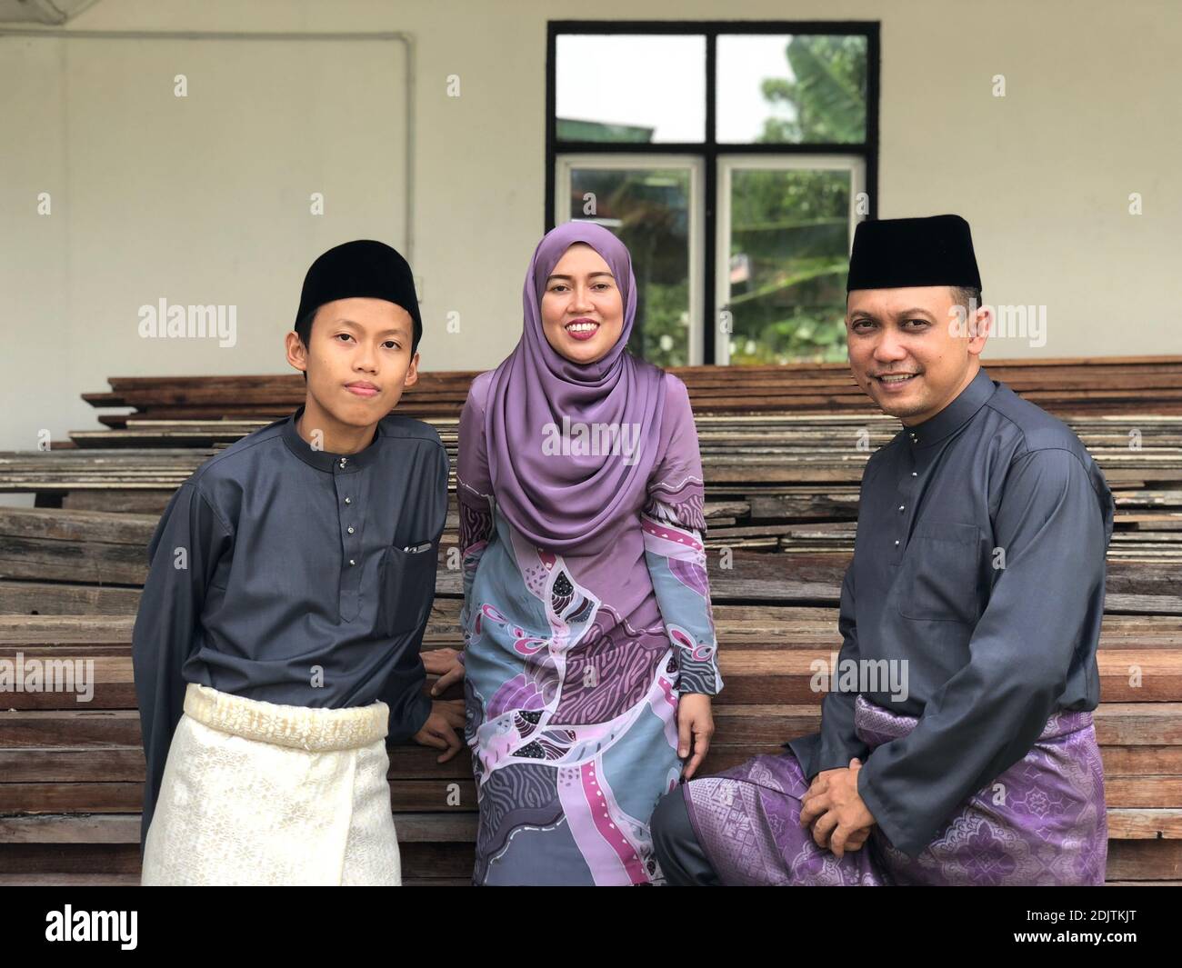 Indian family standing wearing traditional hi-res stock photography and ...