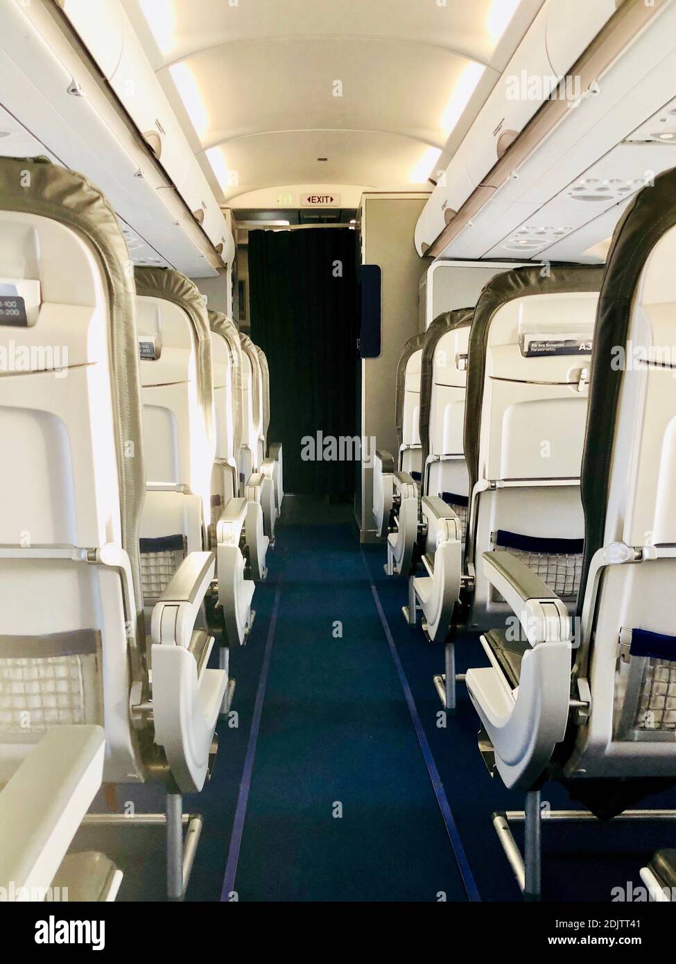 Airplane aisle hi-res stock photography and images - Alamy