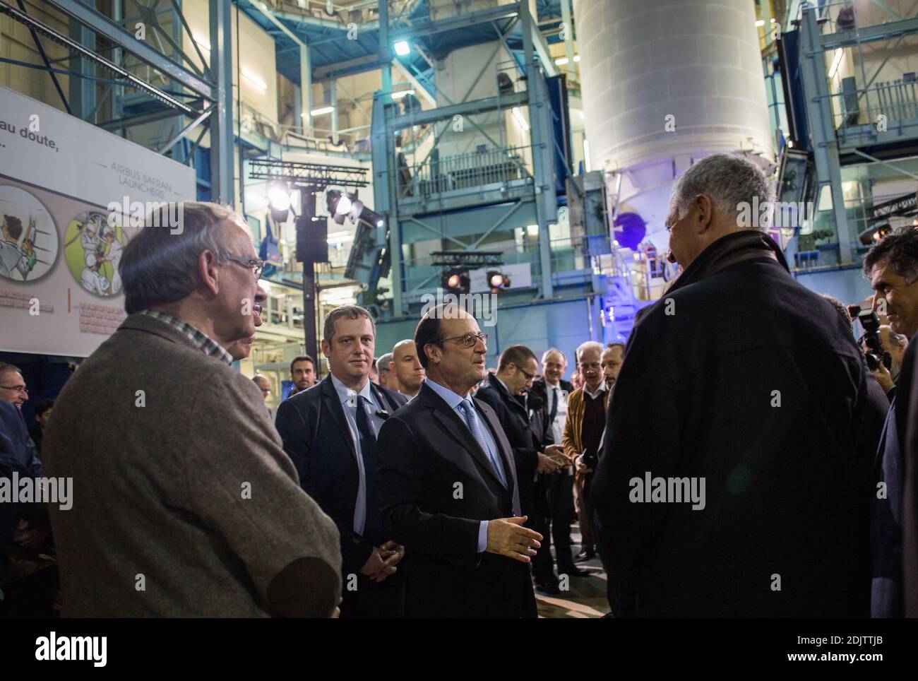 French President Francois Hollande talks to employees of Airbus Safran ...