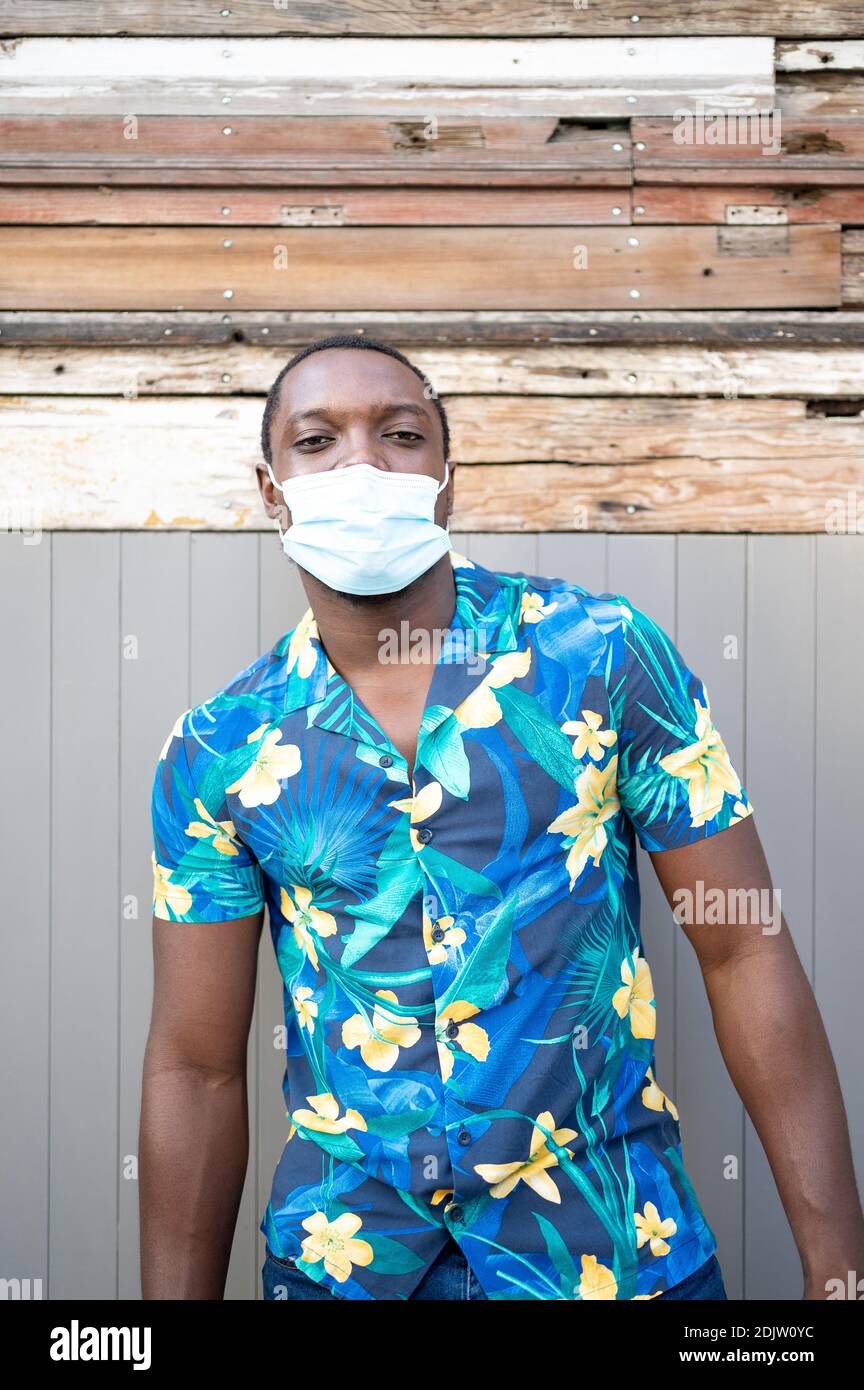 A young black man with a mask in the covid-19 pandemic season Stock ...