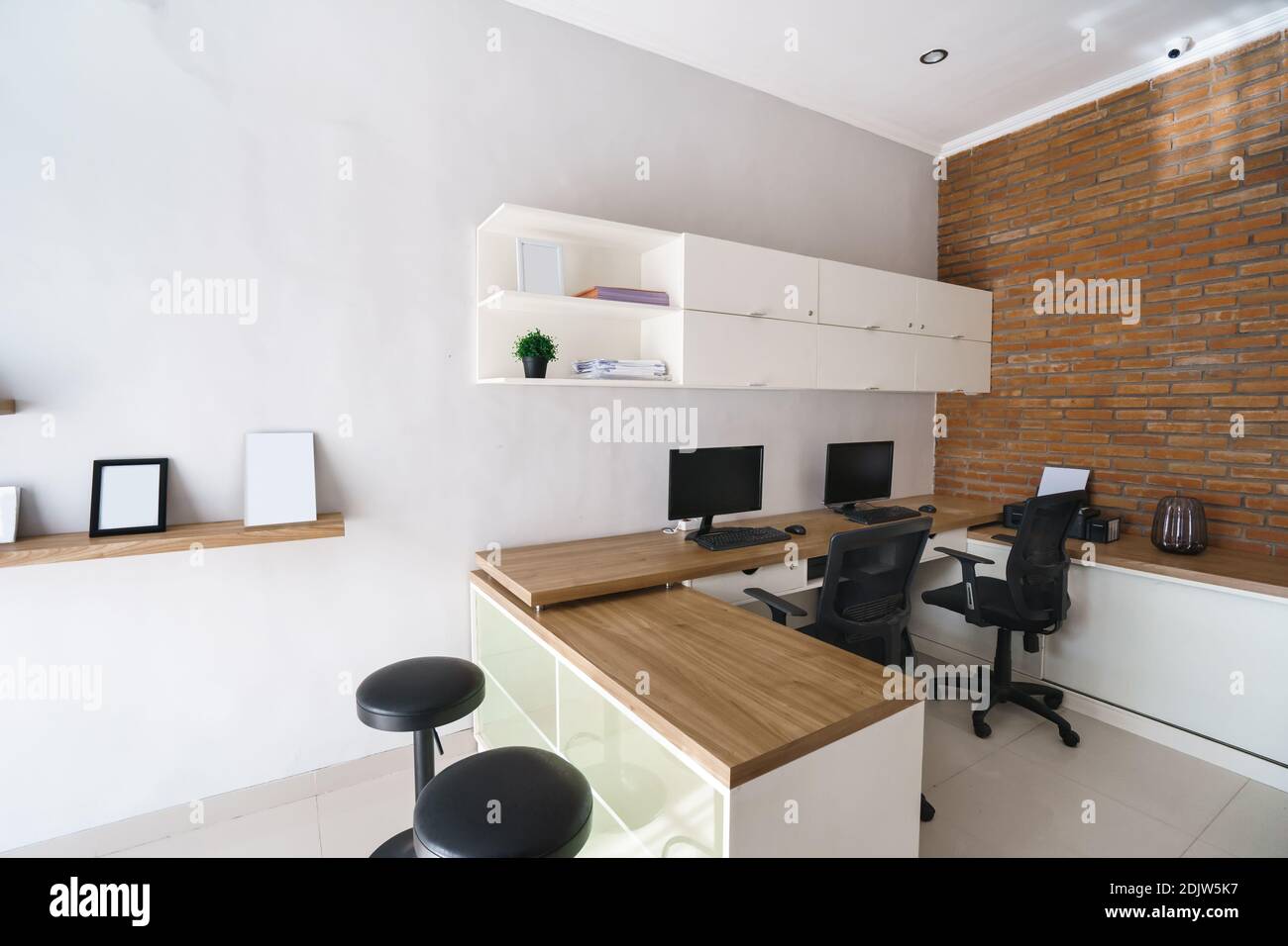 minimalist modern office space interior Stock Photo - Alamy