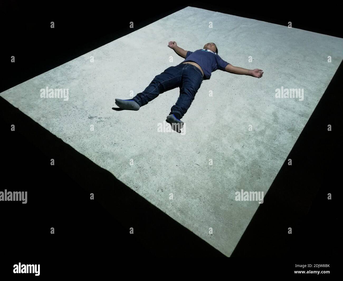 Man lying down arms outstretched hi-res stock photography and images ...