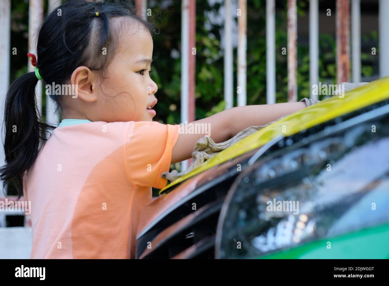 Girl car wash asian hi-res stock photography and images - Alamy