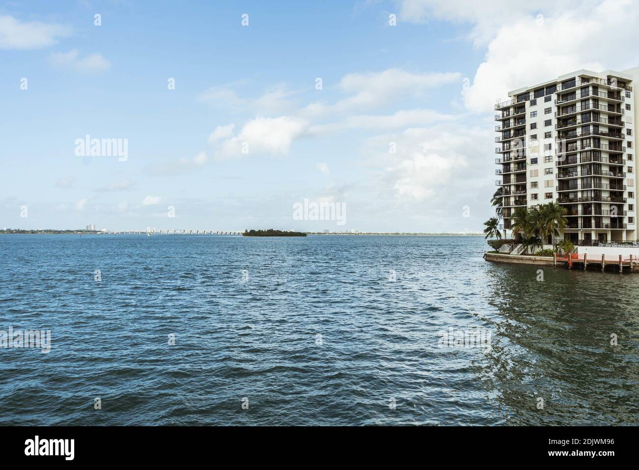 A view of a modern building by the water Stock Photo - Alamy