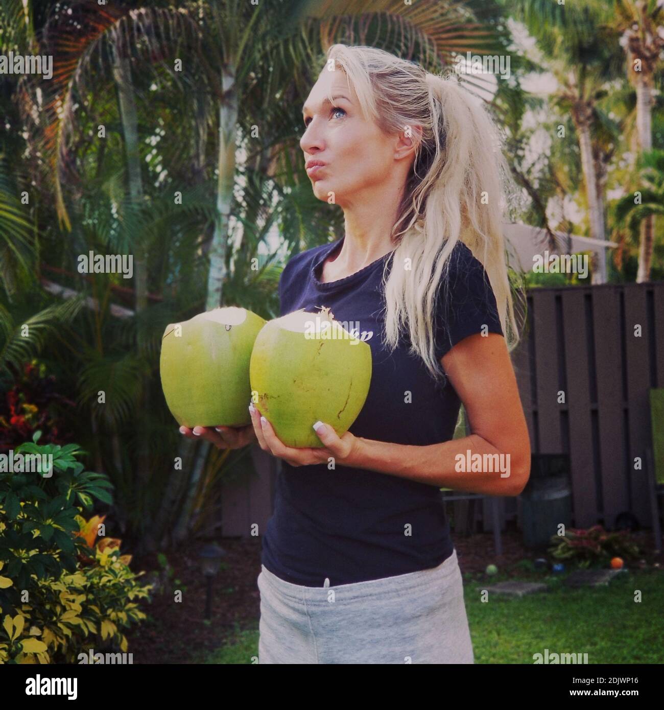 Mature woman coconut hi-res stock photography and images - Alamy