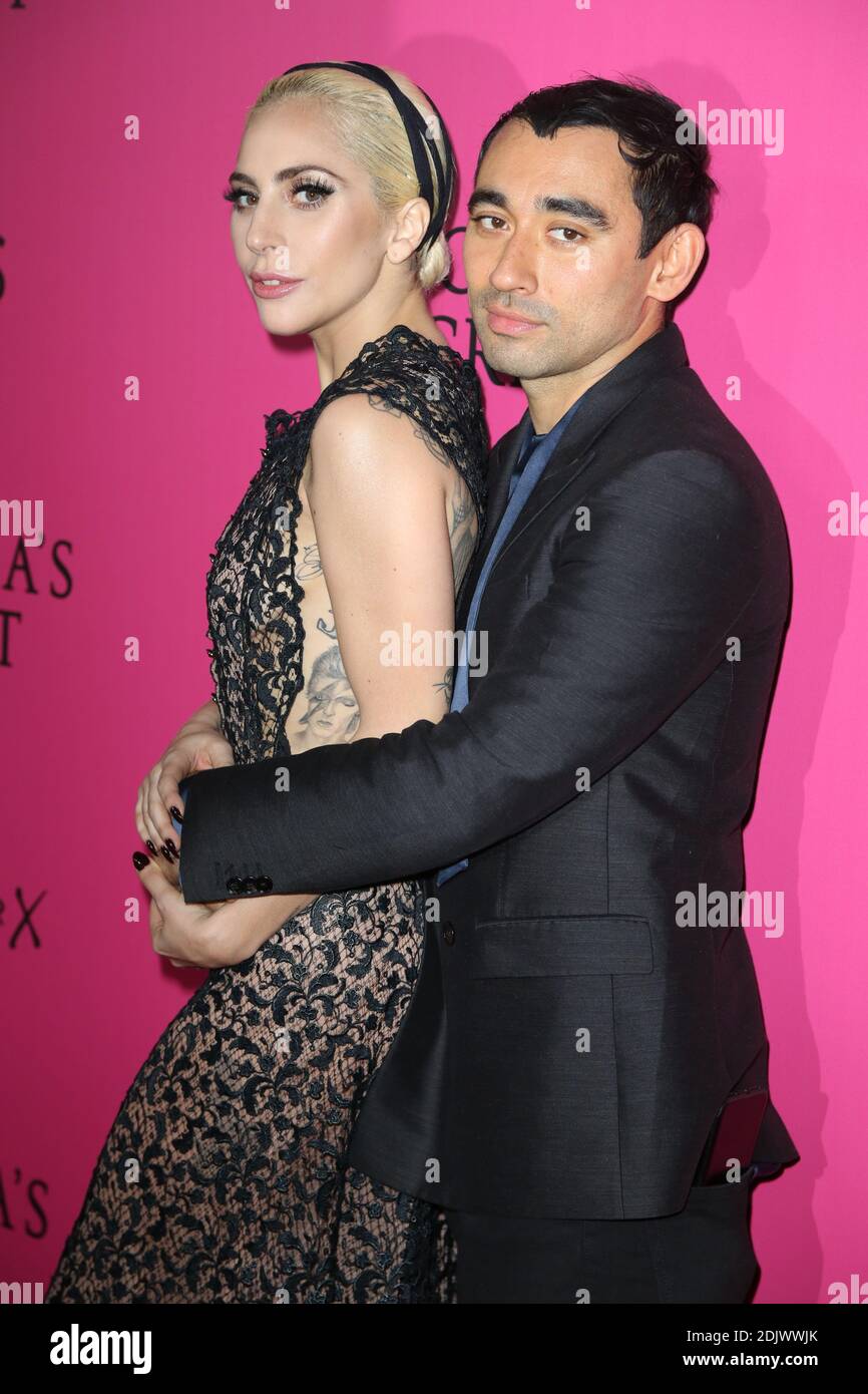 EDITORIAL USE ONLY. Lady Gaga and Nicola Formichetti arriving at the ...