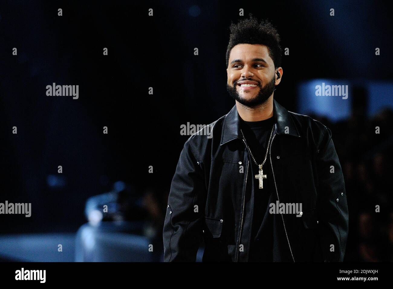 EDITORIAL USE ONLY. The Weeknd performs during the runway at the ...