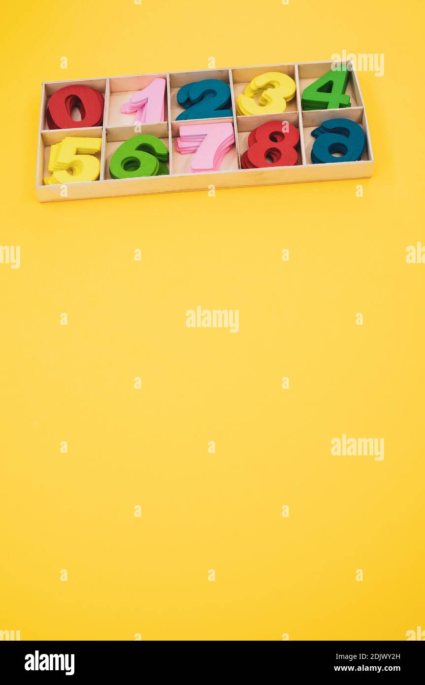A math game for junior age with colored wooden signs of numbers Stock ...