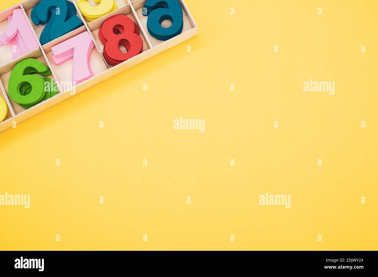 A math game for junior age with colored wooden signs of numbers Stock ...