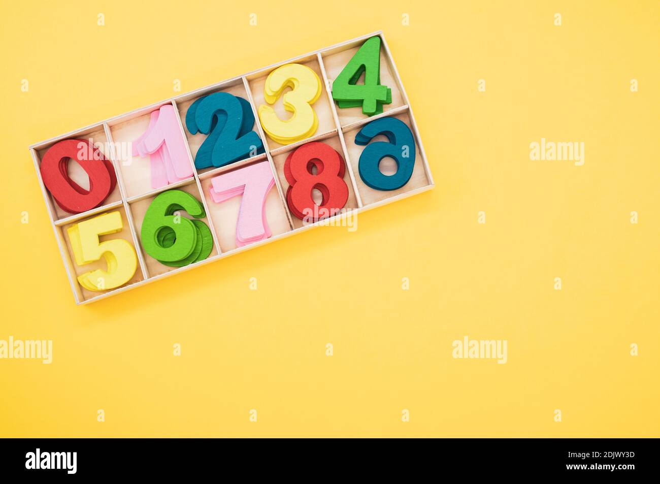 A math game for junior age with colored wooden signs of numbers Stock ...