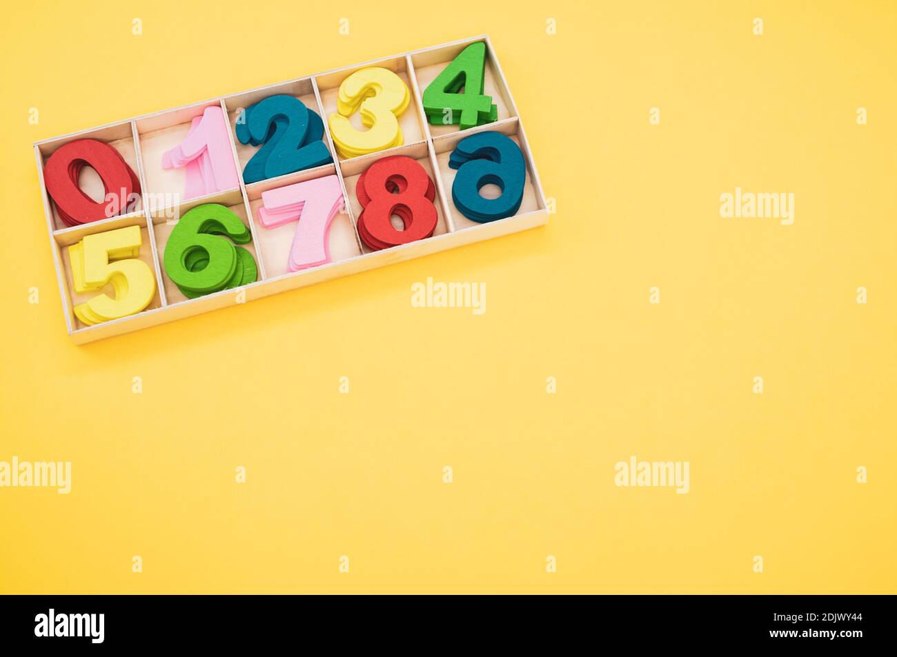 A math game for junior age with colored wooden signs of numbers Stock ...