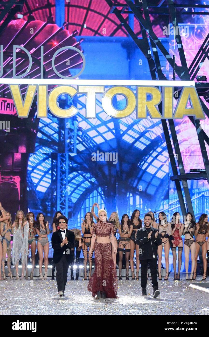 EDITORIAL USE ONLY. Group shot of the models, Lady Gaga and The Weeknd ...