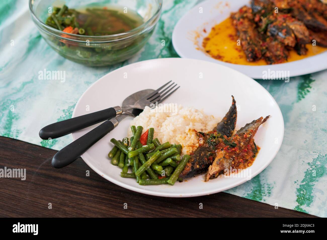 Homemade cooking indonesian food with variety of side dishes Stock ...