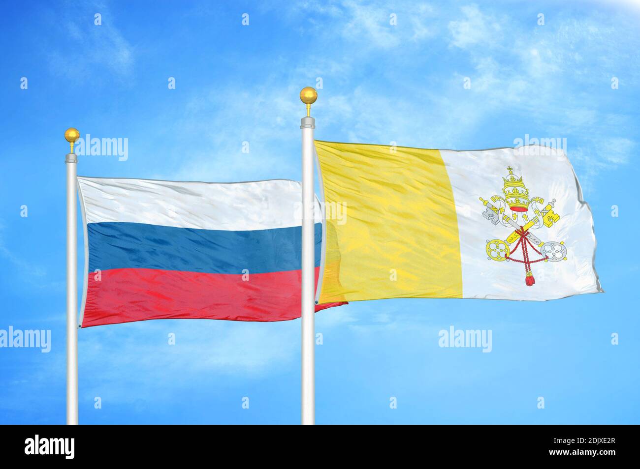 Russia and Vatican two flags on flagpoles and blue cloudy sky Stock ...