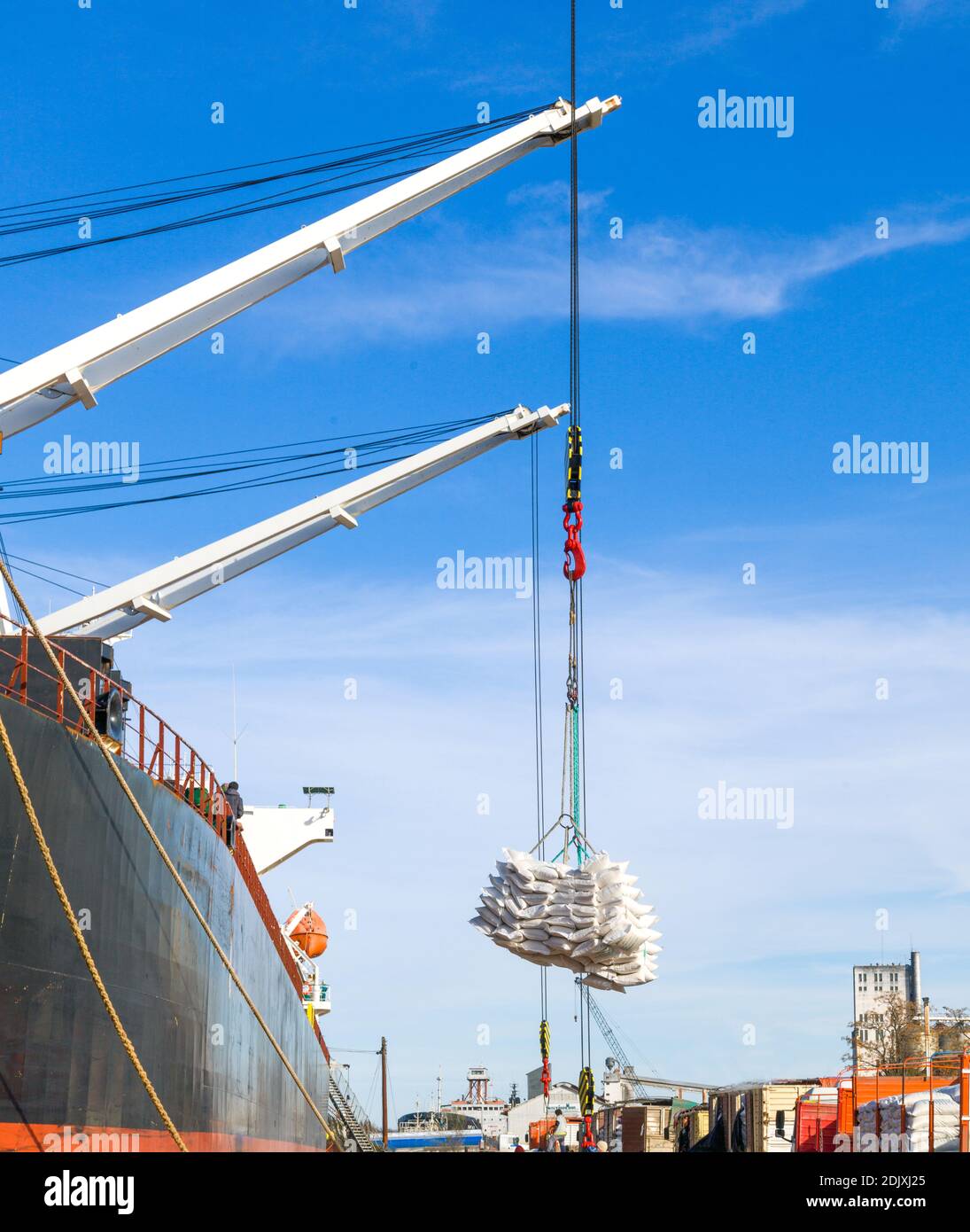 Loading Tons Of Grain Onto Large Overseas Ship Stock Photo - Alamy