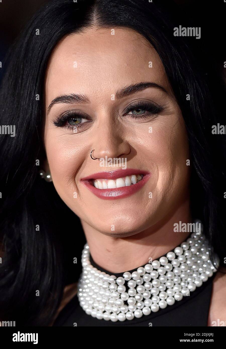 Katy Perry still wearing her Nike gold tooth jewelry attends the ...