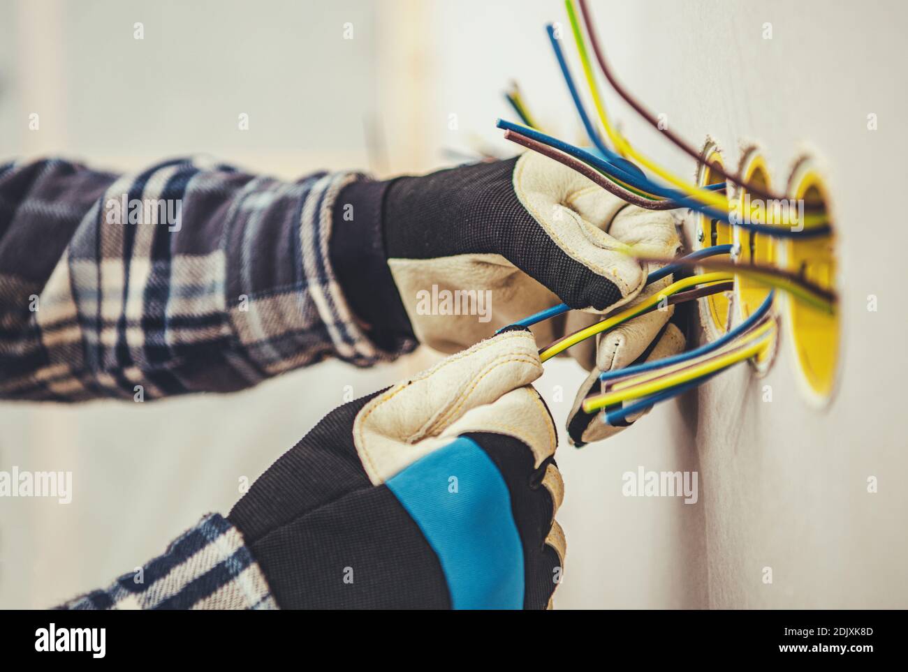 Electrician working on wall outlet hi-res stock photography and images ...