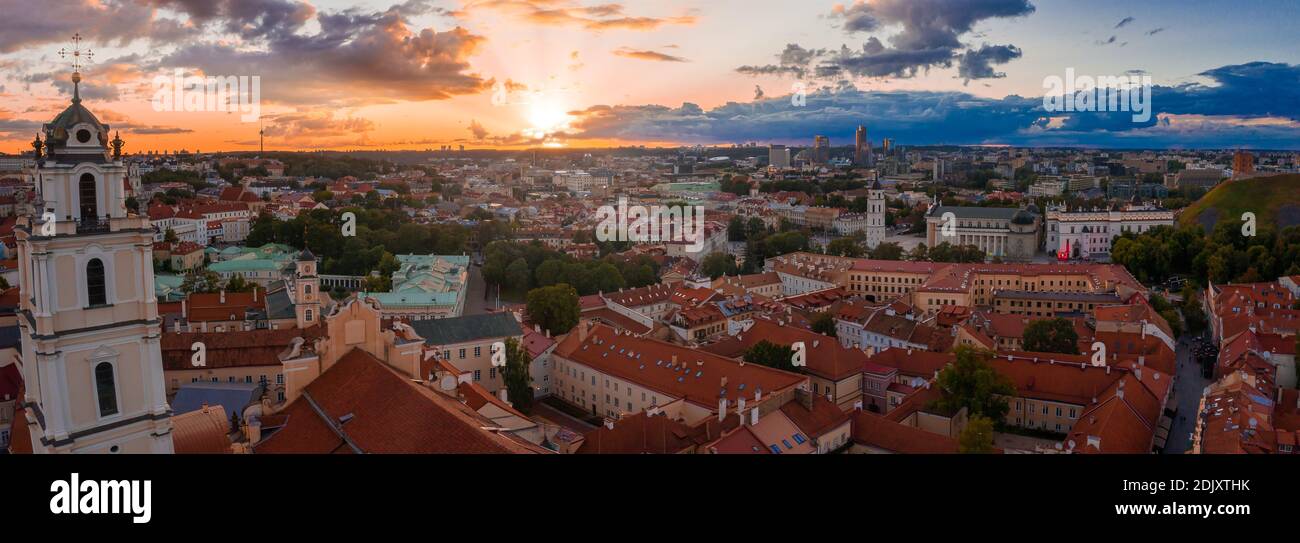 A panoramic shot of Vilnius under a cloudy sky during the sunset in the ...