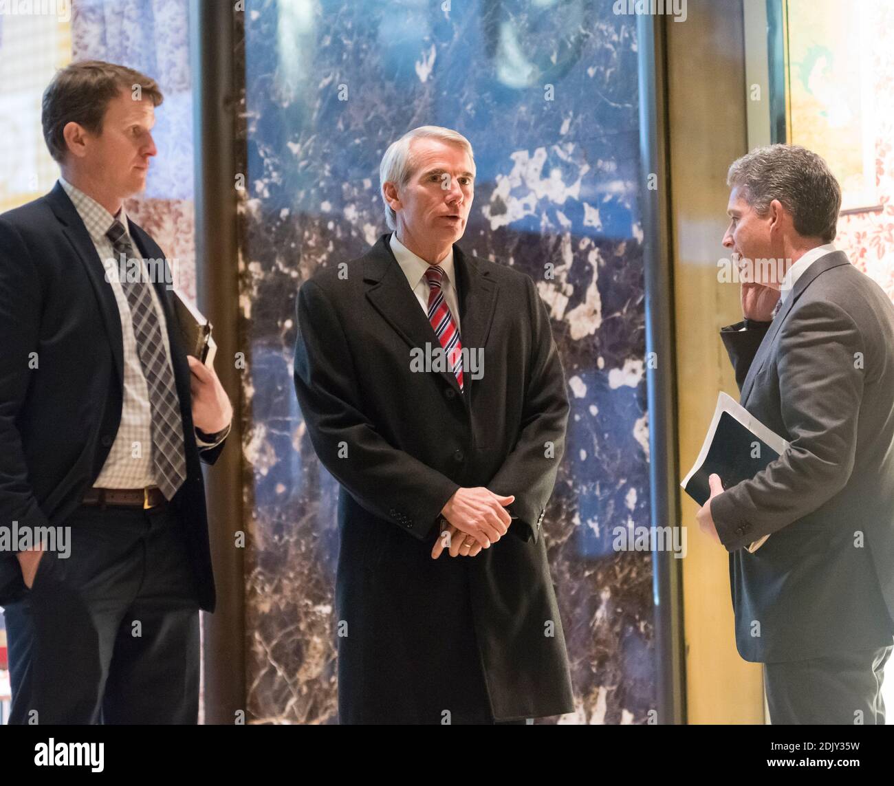 Ohio Senator Robert Portman is seen in the lobby of Trump Tower in New ...