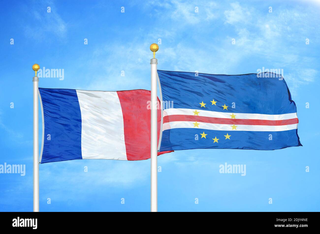 France and Cape Cabo Verde two flags on flagpoles and blue cloudy sky ...