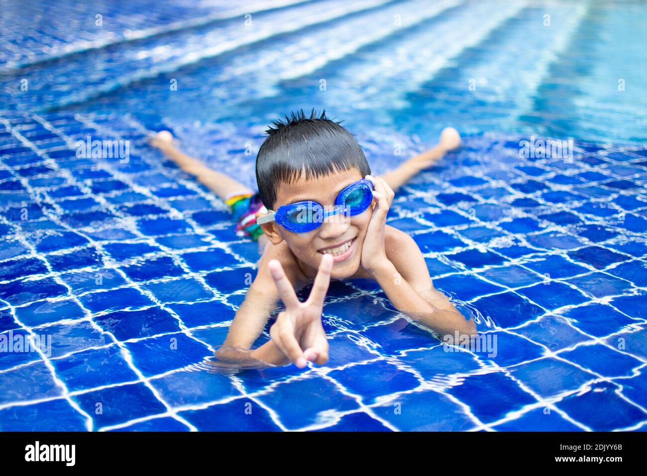 Boys Lying Pool High Resolution Stock Photography and Images - Alamy