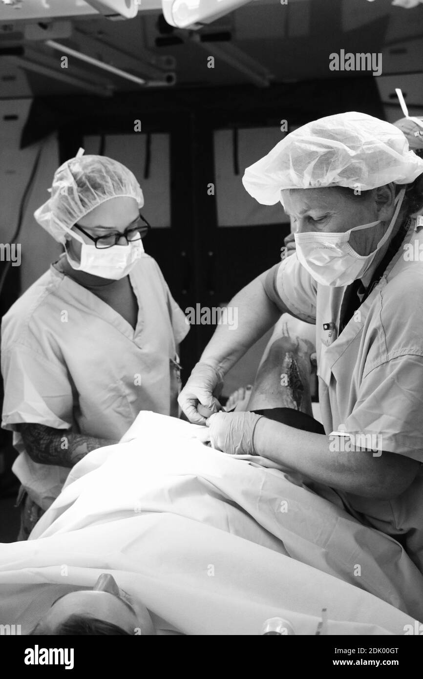 Assistance operations Black and White Stock Photos & Images - Alamy