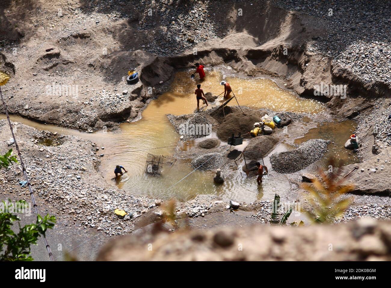 Small scale gold miner hi-res stock photography and images - Alamy