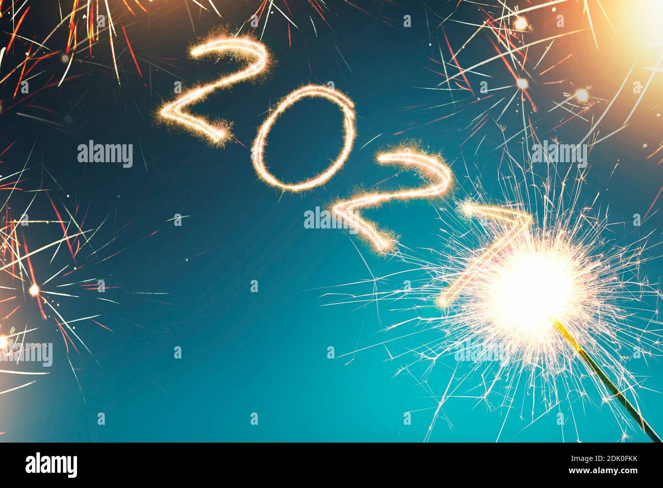 2021 written sparkles with a bright background. Happy New Year 2021 ...